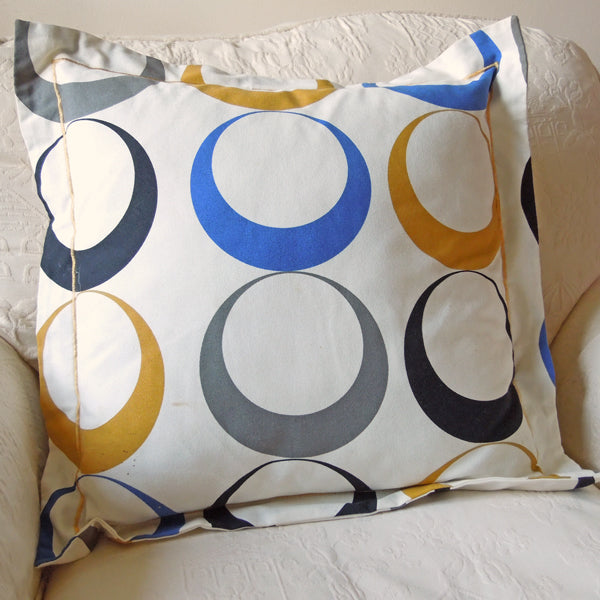 Eclipse Circles Cushion, Handmade in a Cotton Blue and Gold Eclipse Pr ...
